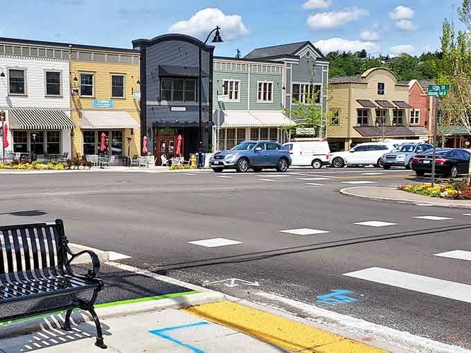 Modern roundabouts meet colorful storefronts where planning and preservation shake hands and actually get along beautifully together.