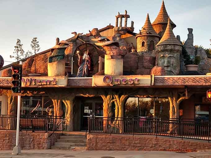 Golden hour bathes this fantasy castle in warm light, making the turrets and towers glow with magical promise.