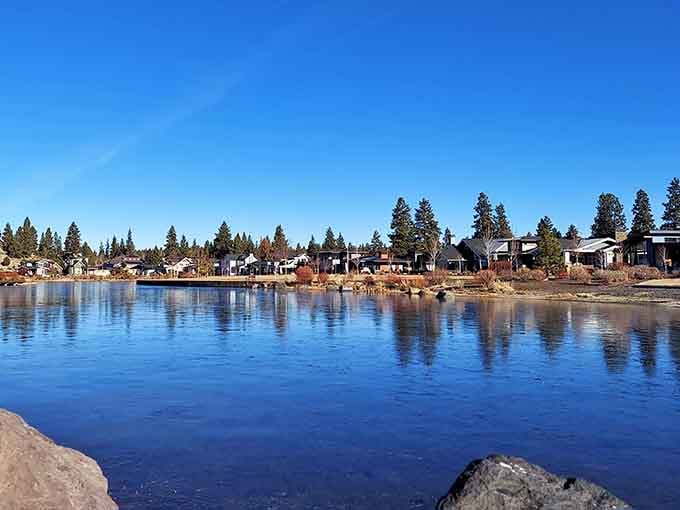 Mirror-like water reflects the blue sky, making you wonder which way is up in this peaceful scene.