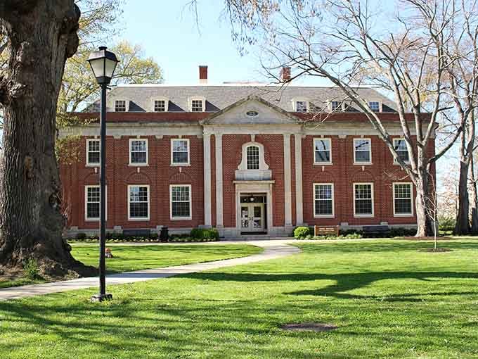 This brick beauty with its manicured lawn proves that elegance doesn't need to shout to be heard loud and clear.