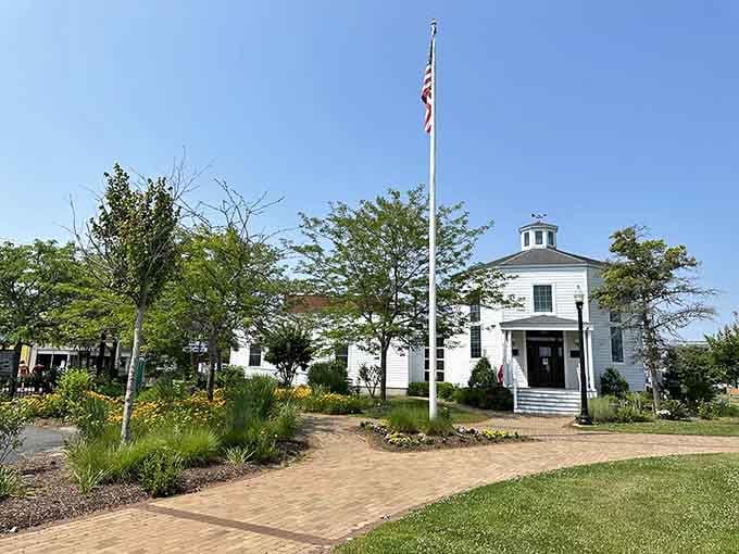 The classic white building with its cupola stands proud, a timeless reminder of simpler, sweeter days.
