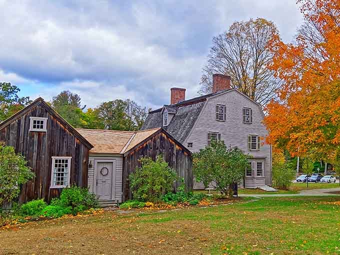 The weathered outbuildings and main house create a perfect autumn tableau that would make any history buff's heart skip.