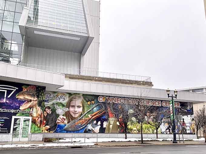 Colorful murals wrap the exterior, hinting at the hands-on wonders and experiments happening inside these walls.