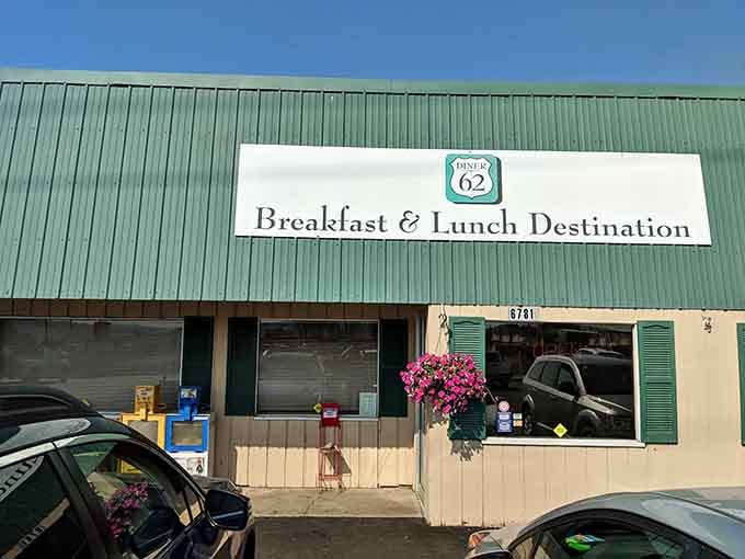 Fresh flowers at the entrance and that welcoming sign promise the kind of home cooking that keeps regulars coming back.