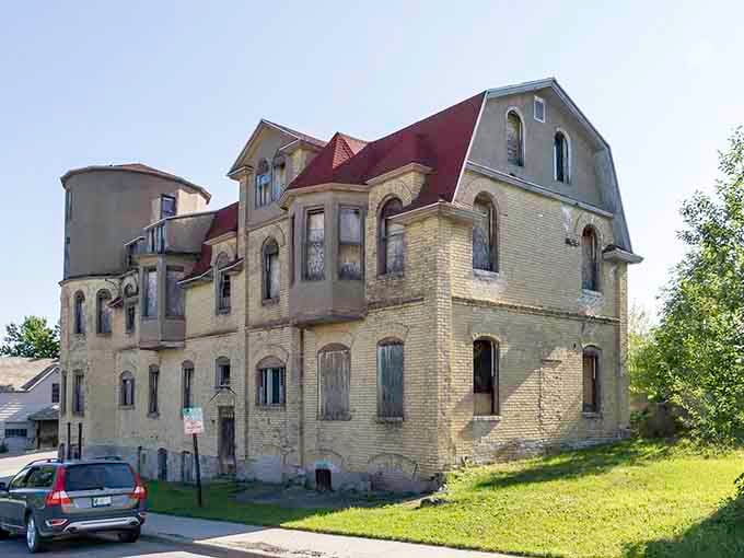 Arched windows and weathered brick create an architectural mystery that would make even Sherlock Holmes pause admiringly.