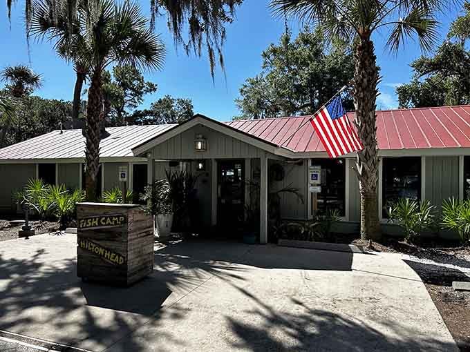 Palm trees frame this inviting entrance where Lowcountry architecture and fresh catches create the perfect island dining destination you've been seeking.