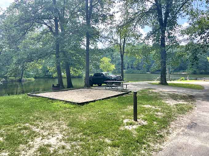 Your own lakeside campsite with a picnic table and water view beats any hotel room, hands down.