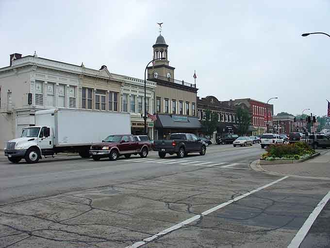 The clock tower stands sentinel over Main Street, keeping time for generations who've walked these sidewalks.