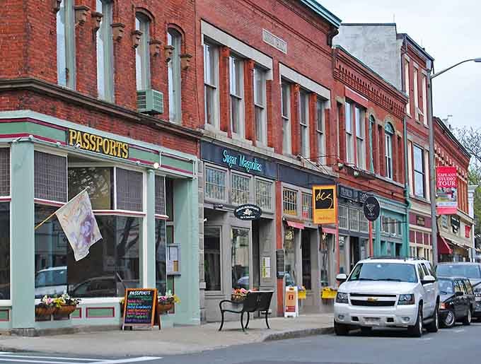 Brick buildings in cheerful colors line up like old friends, each storefront holding its own slice of neighborhood history.