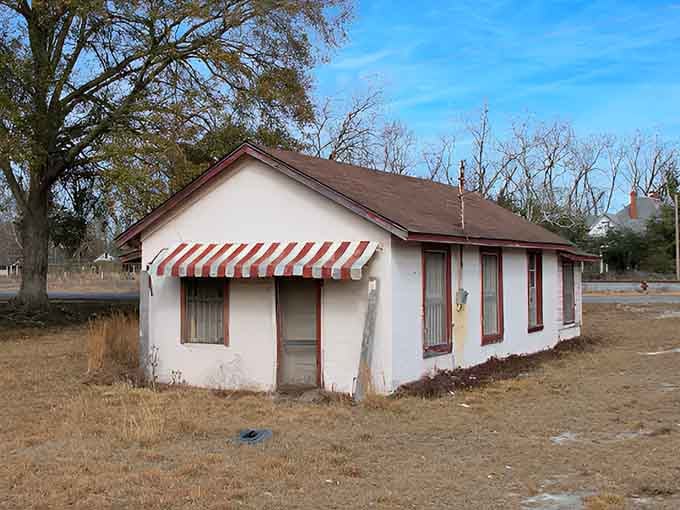 That cheerful striped awning adds a touch of old-fashioned charm to this quiet corner of authentic small-town Georgia.