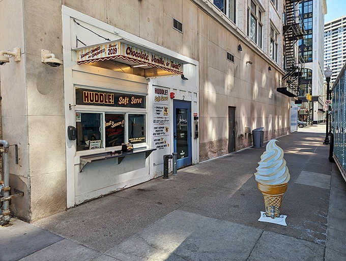 That oversized cone sculpture standing guard outside is basically saying "yes, we're serious about our soft serve here."