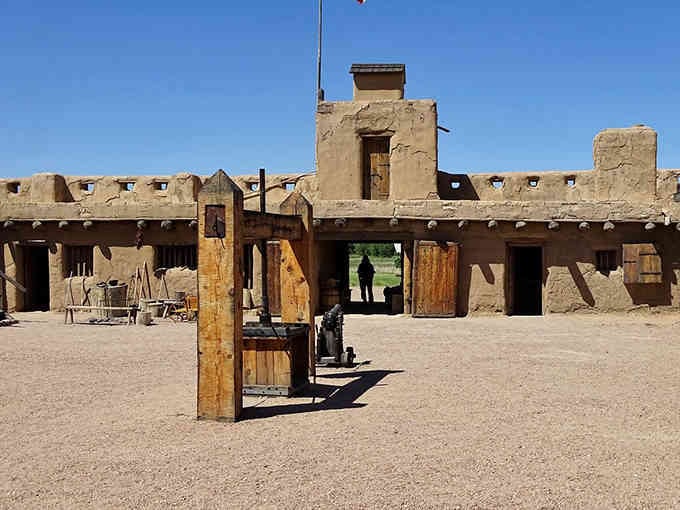 This reconstructed adobe fort stands as a testament to frontier life when silence was survival and neighbors were miles away.