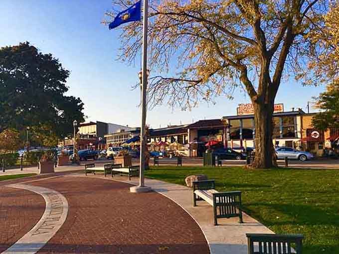 Evening light bathes the square where locals gather to unwind after a day well spent in their community.