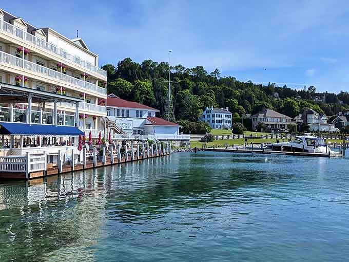 Waterfront buildings and docked boats create a postcard scene that's been charming visitors for generations beyond counting.