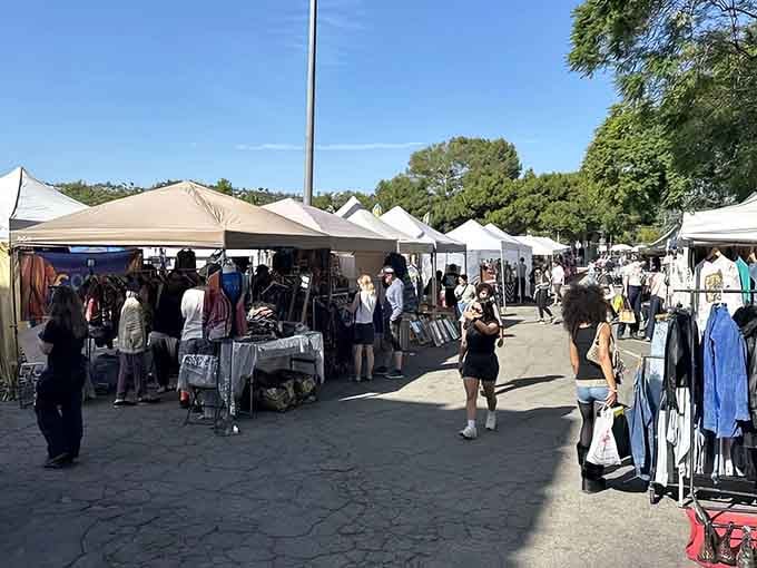 Rows of white tents create a village of possibilities where artists and collectors meet under California sunshine.