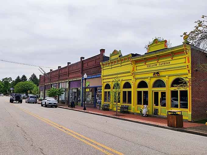 That bright yellow tavern practically shouts "come on in!" while its neighbors add their own colorful personalities.