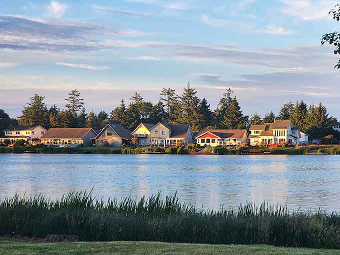 Waterfront homes catching the evening light along Ocean Shores' quiet shores where time slows down just right.