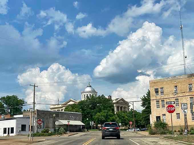 Dramatic clouds roll over the white-domed courthouse like nature's own theatrical backdrop for downtown life.