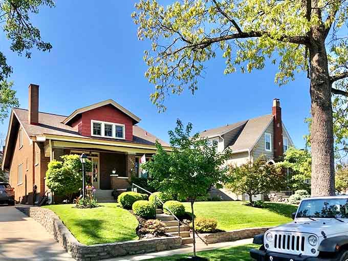 Craftsman-style porches and mature trees line sidewalks where kids still ride bikes and neighbors still chat over fences.