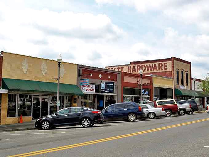 Classic storefronts and vintage hardware signs remind you when Main Street actually meant something to a community.