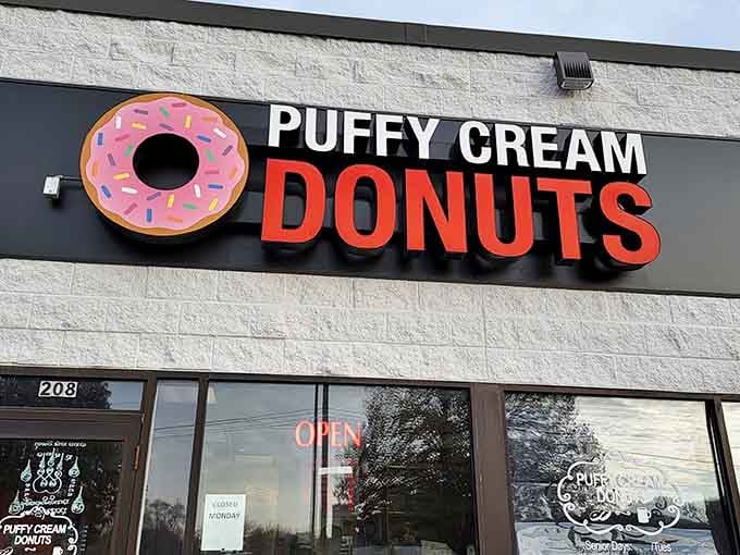 Bold red letters announce what's inside: puffy, cream-filled clouds of joy that'll make your morning absolutely perfect.