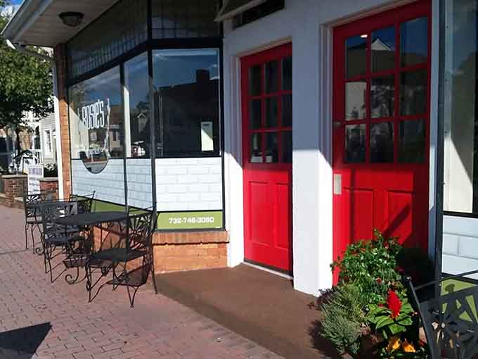 Rosie's charming brick patio with wrought-iron furniture whispers "stay awhile" louder than any neon sign ever could.