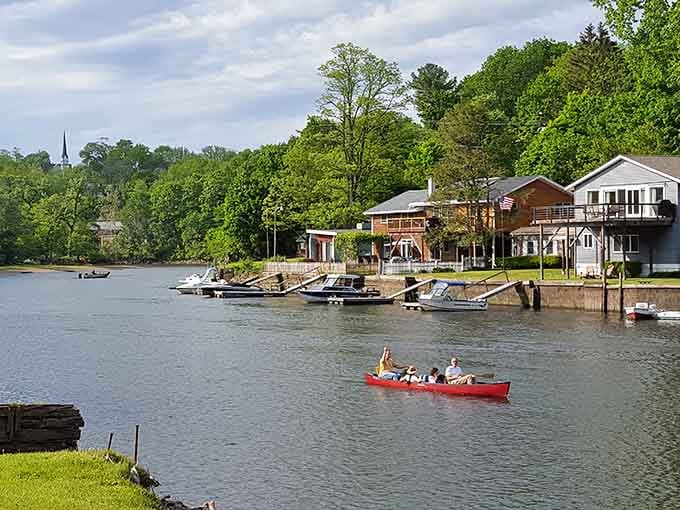 Canoes gliding past waterfront homes &ndash; this is what summer afternoons were meant to look like.