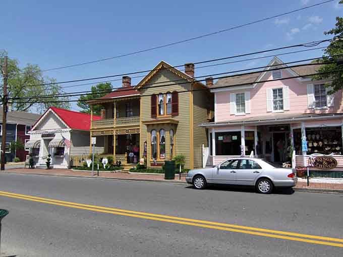 Victorian buildings painted in cheerful pastels line the street like a box of old-fashioned saltwater taffy.