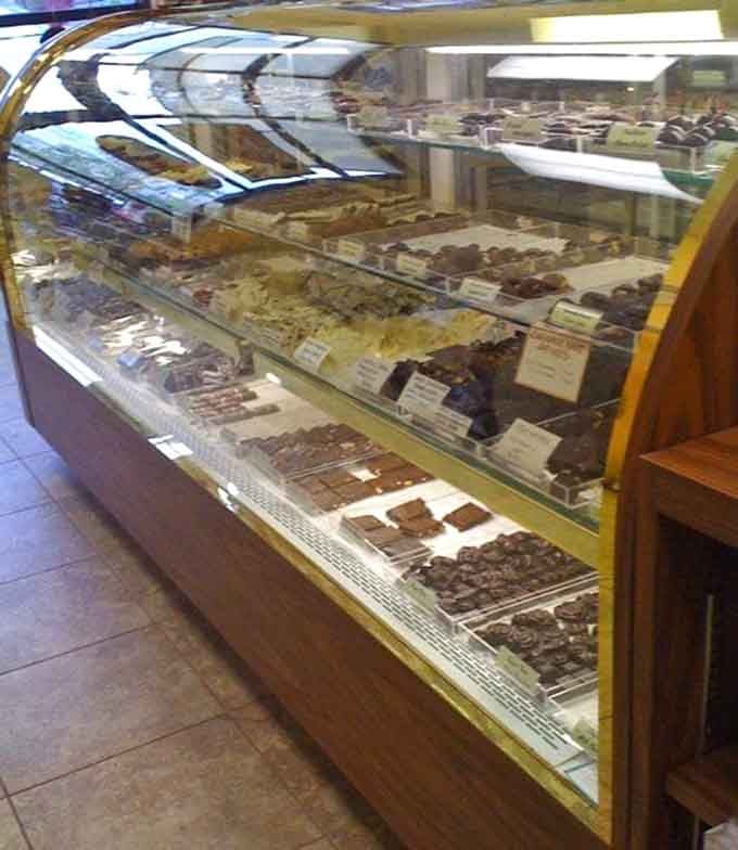 This curved glass case stretches endlessly, packed with more chocolate varieties than you knew existed on Earth.