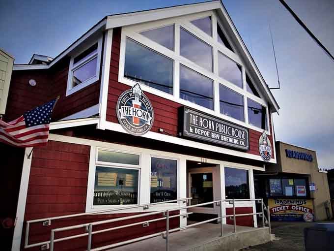 Those massive windows frame ocean views that pair perfectly with craft beer and coastal comfort food.
