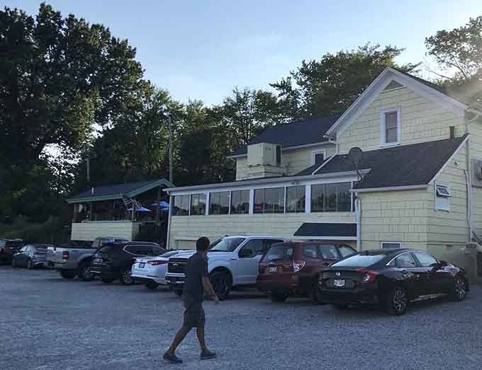 Evening light catches this beloved lakeside retreat where casual dining meets surprisingly sophisticated seafood selections every day.