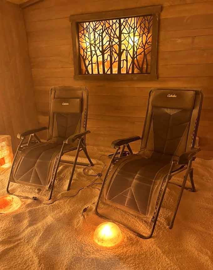 Wooden walls and that beautiful backlit artwork create a cozy cabin vibe that happens to clear your sinuses too.