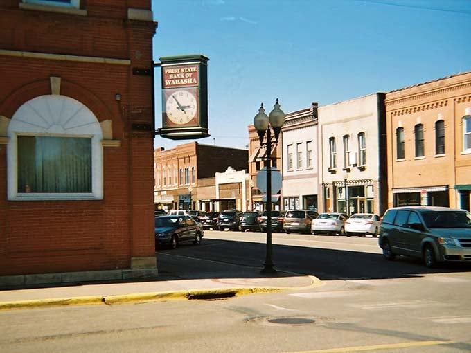 The town clock keeps perfect time while the buildings around it keep perfect character and charm.