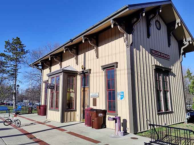 This charming depot building with decorative trim looks ready to welcome travelers just like it did generations ago.