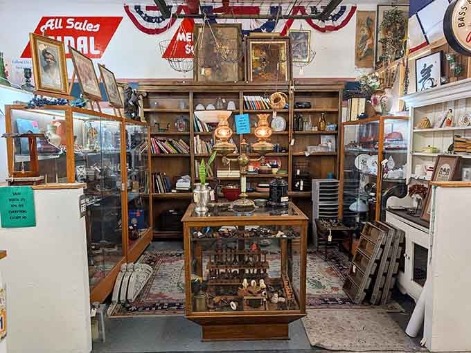 Patriotic bunting frames a booth packed with treasures that span generations of American collecting passion.