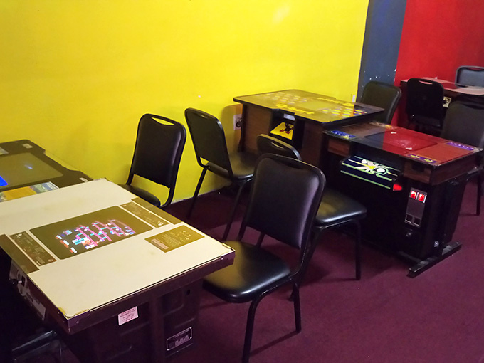 Cocktail-style arcade tables where you can sit, sip, and settle old scores from your childhood, all at once.