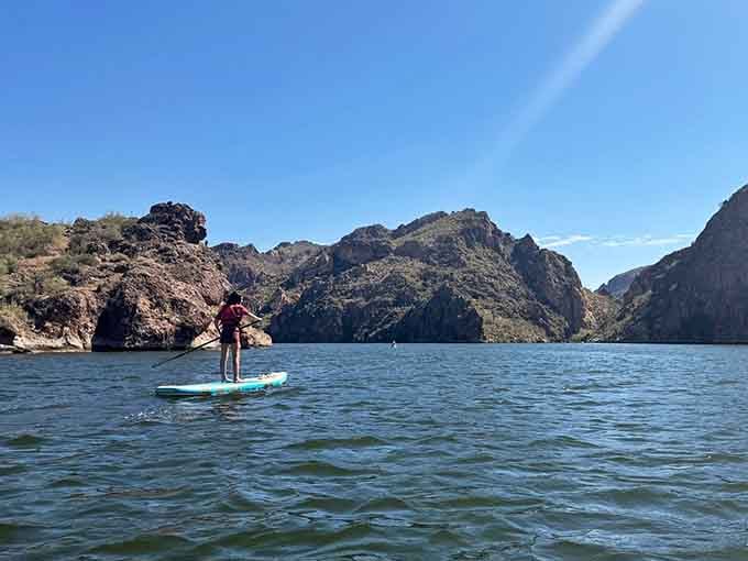 Paddleboarding with a backdrop like this makes you wonder why anyone exercises indoors with fluorescent lighting overhead.