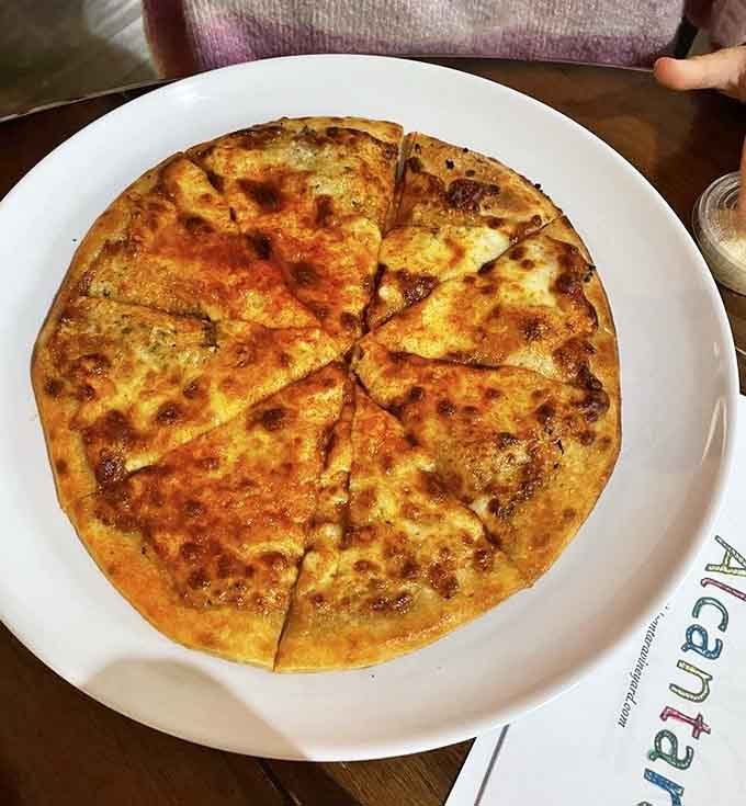 Golden, bubbly, and perfectly cheesy &ndash; this pizza understands the assignment and aced the test with extra credit.