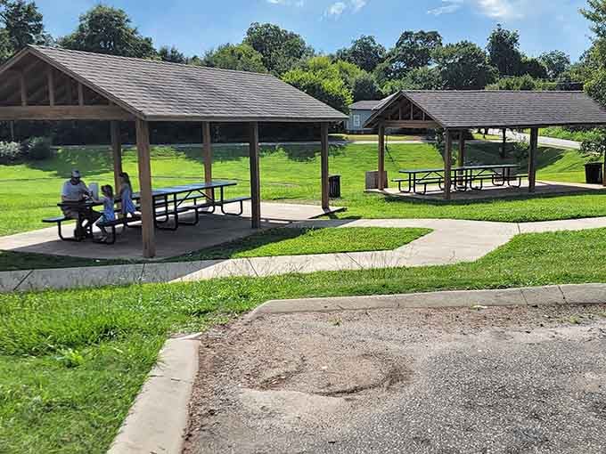 Covered pavilions and green space where people actually gather. Parks should look inviting, and this one nails the assignment perfectly.