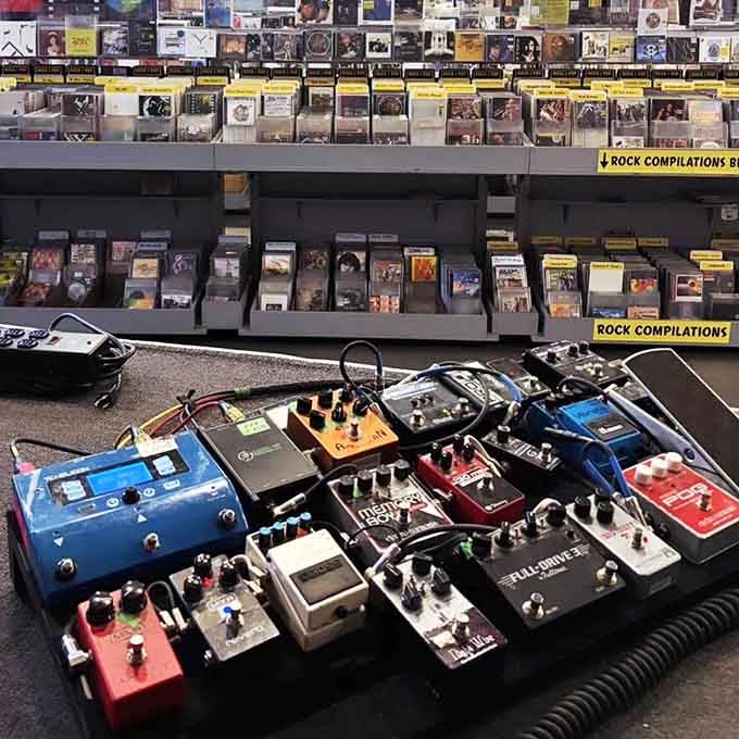 Guitar pedals displayed like precious gems, ready to help someone create the next legendary riff or solo.