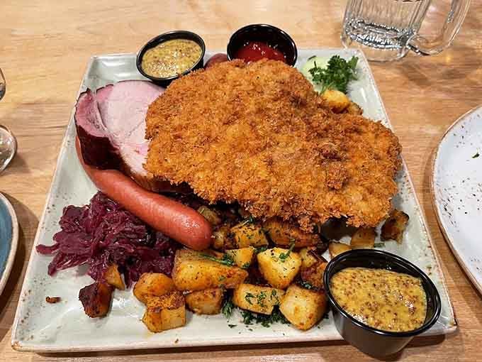 This platter's got more German meats than a Munich butcher shop, and those crispy potatoes are stealing the show.