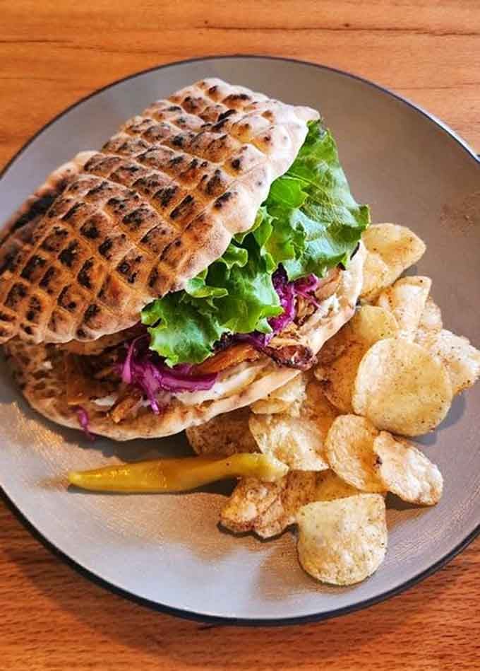 That spicy chicken d&ouml;ner wrapped in charred flatbread is basically a flavor bomb disguised as lunch, and you're about to defuse it.