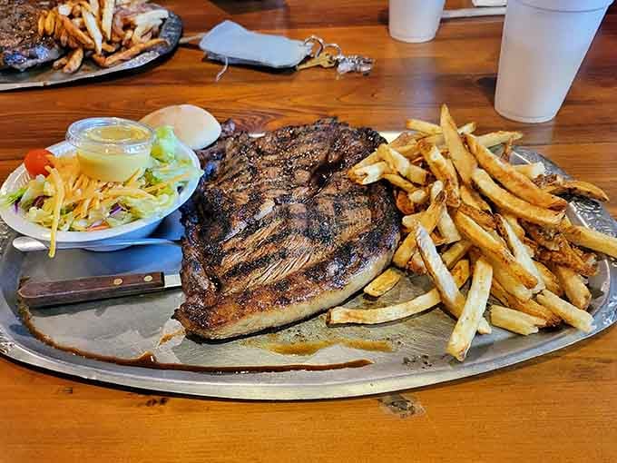 When your sirloin needs its own zip code, you know you've ordered correctly at this riverside gem.