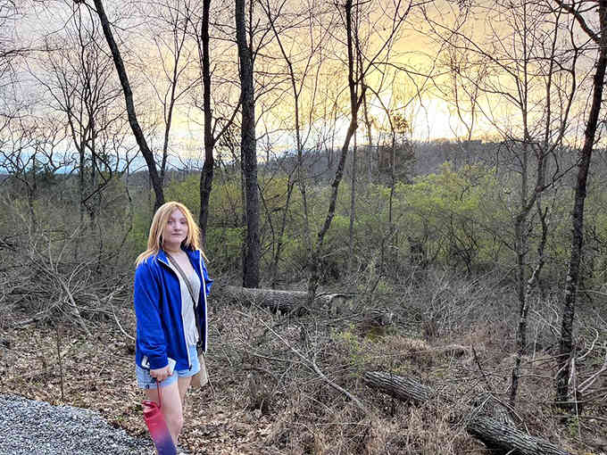 Standing among bare trees at dusk, you can almost feel the weight of millennia beneath your feet.