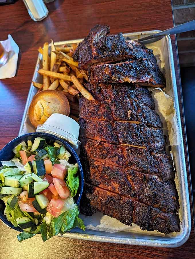 This isn't just lunch, it's a full-scale barbecue production complete with golden fries and all the fixings.
