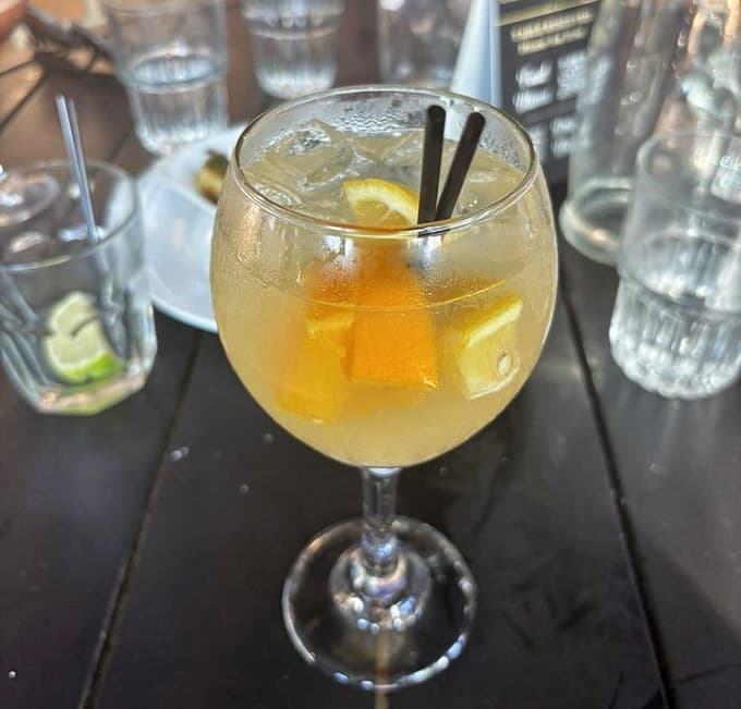 Golden and glowing like a Low Country sunset, this sangria knows how to make an entrance at your table.