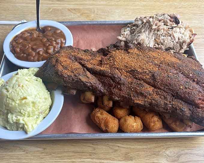 Those ribs have a bark so perfect they should be in a museum, right next to the coleslaw and hushpuppies.