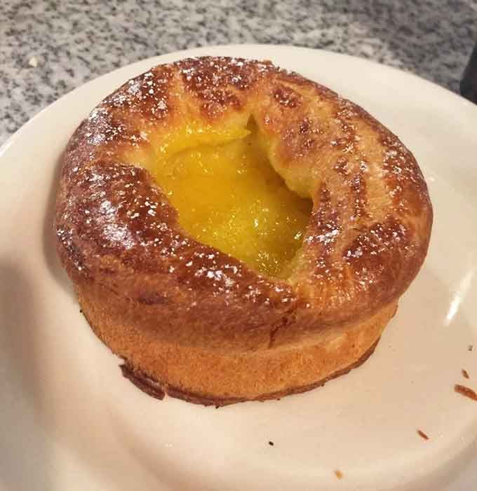 Golden brioche cradling bright lemon curd is sunshine you can eat, and yes, that's perfectly acceptable breakfast logic.