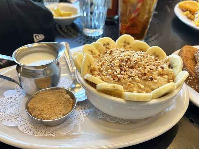 Oatmeal topped with fresh bananas and nuts, proving healthy choices don't have to feel like punishment at all.