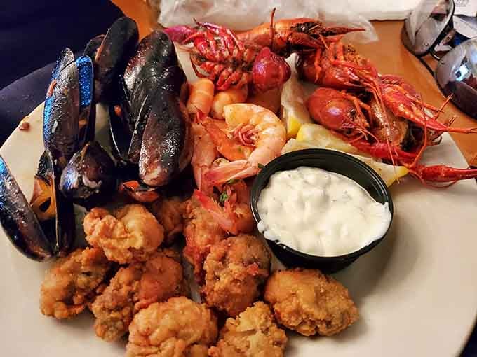 When mussels, crawfish, and fried clams share a plate, you know someone's making excellent life choices today.